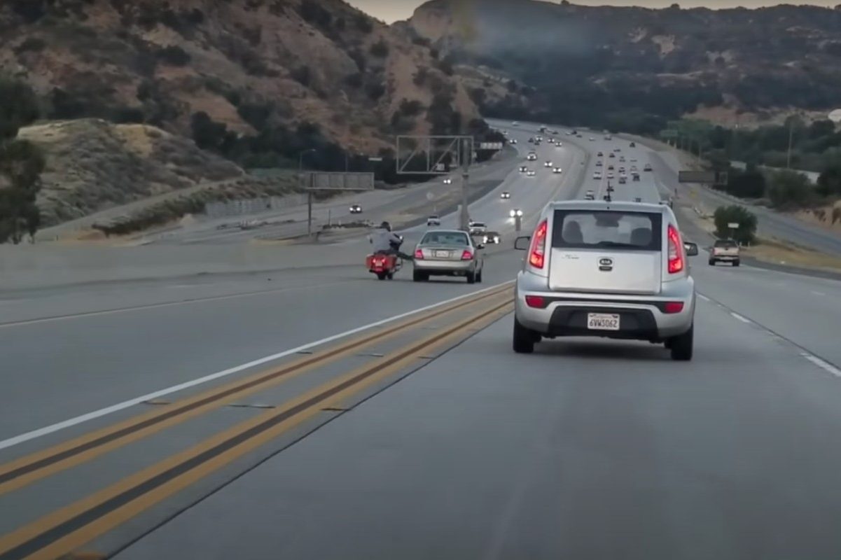Motorcyclist Kicks Car and Causes Insane Chain-Reaction Crash - alt_driver
